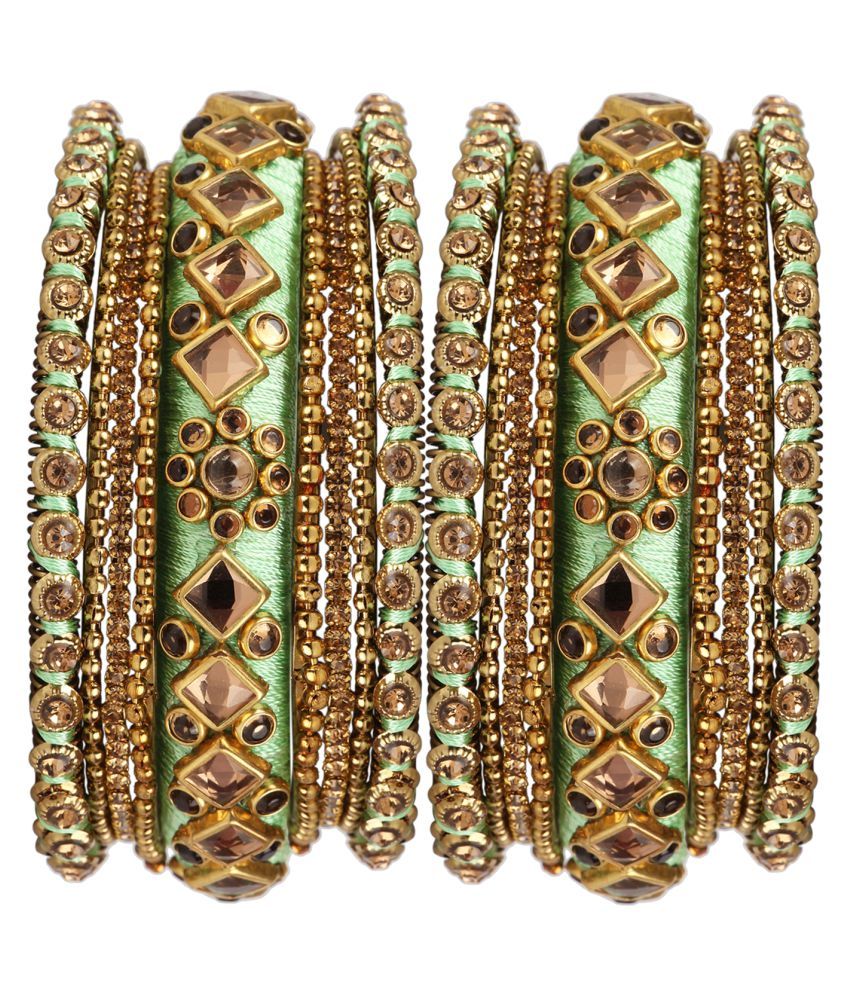 Accessorisingg Traditional Indian Silk Thread Bangles with Kundan ...